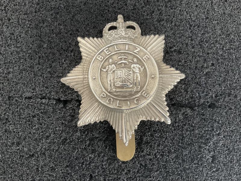 Q/C Belize Police cap badge made by FIRMIN LONDON. – Gradia Militaria